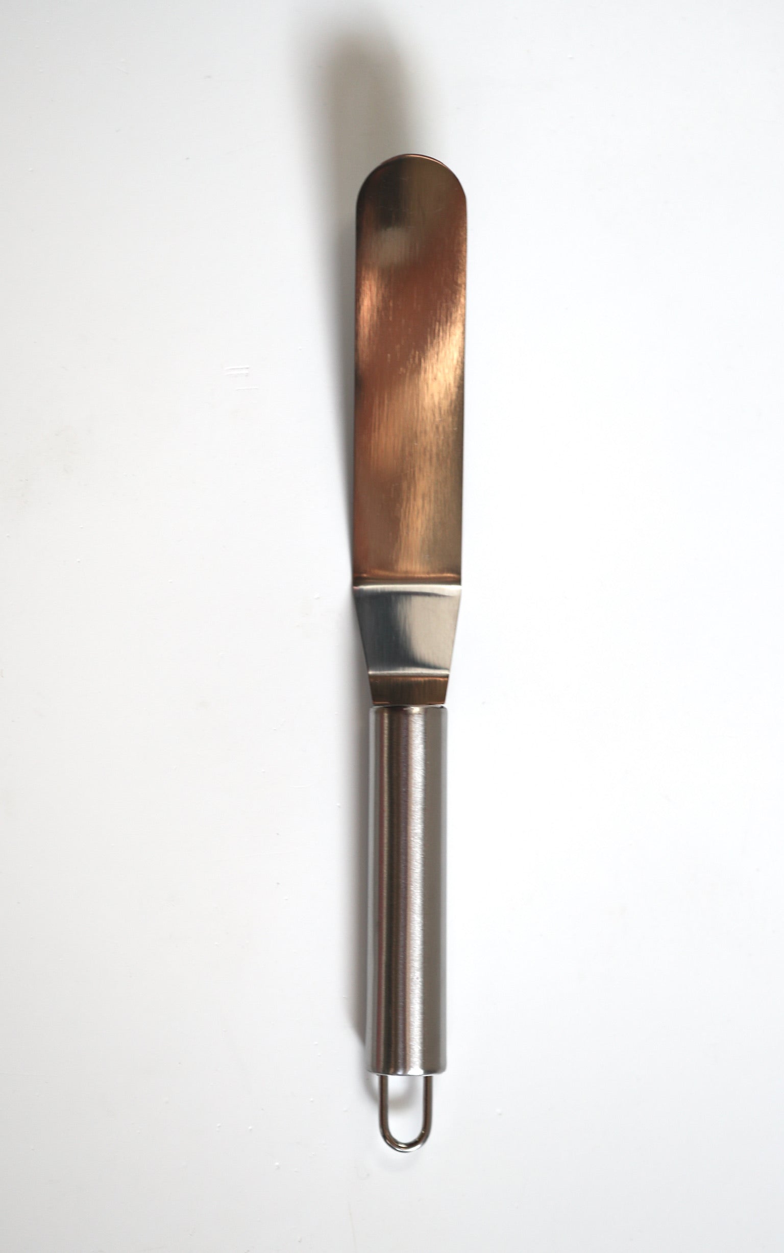 Stainless steel curved spatula – Sylvie Coulange
